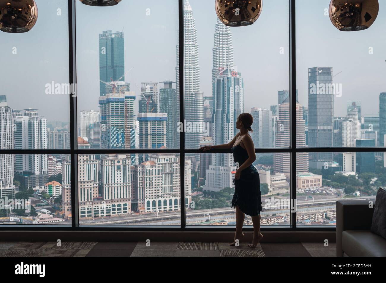 Woman standing comfortable home hi-res stock photography and images - Alamy
