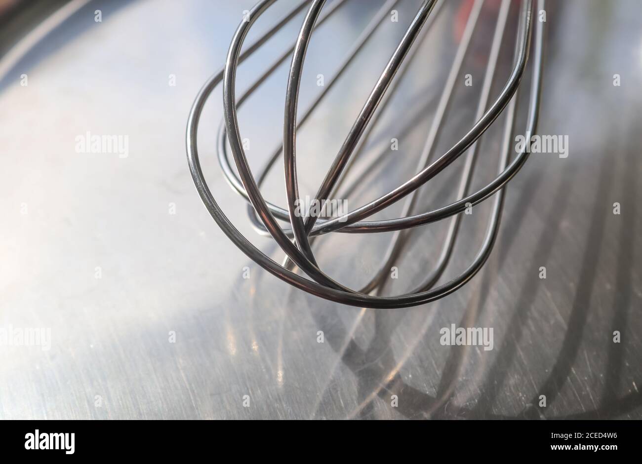 Manual hand mixer for blending, beating, Egg beater isolated on metal ...