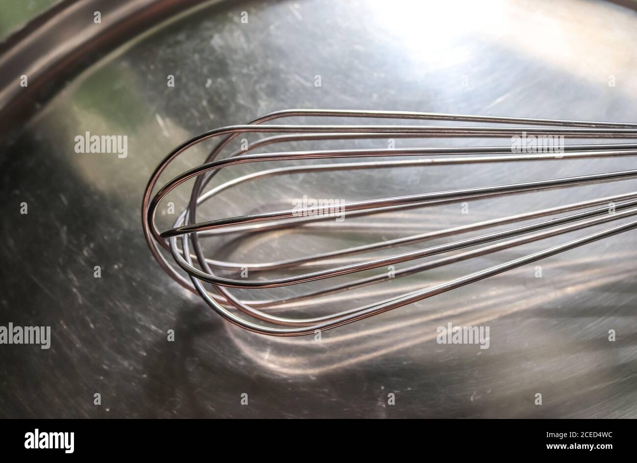 Manual hand mixer for blending, beating, Egg beater isolated on metal ...