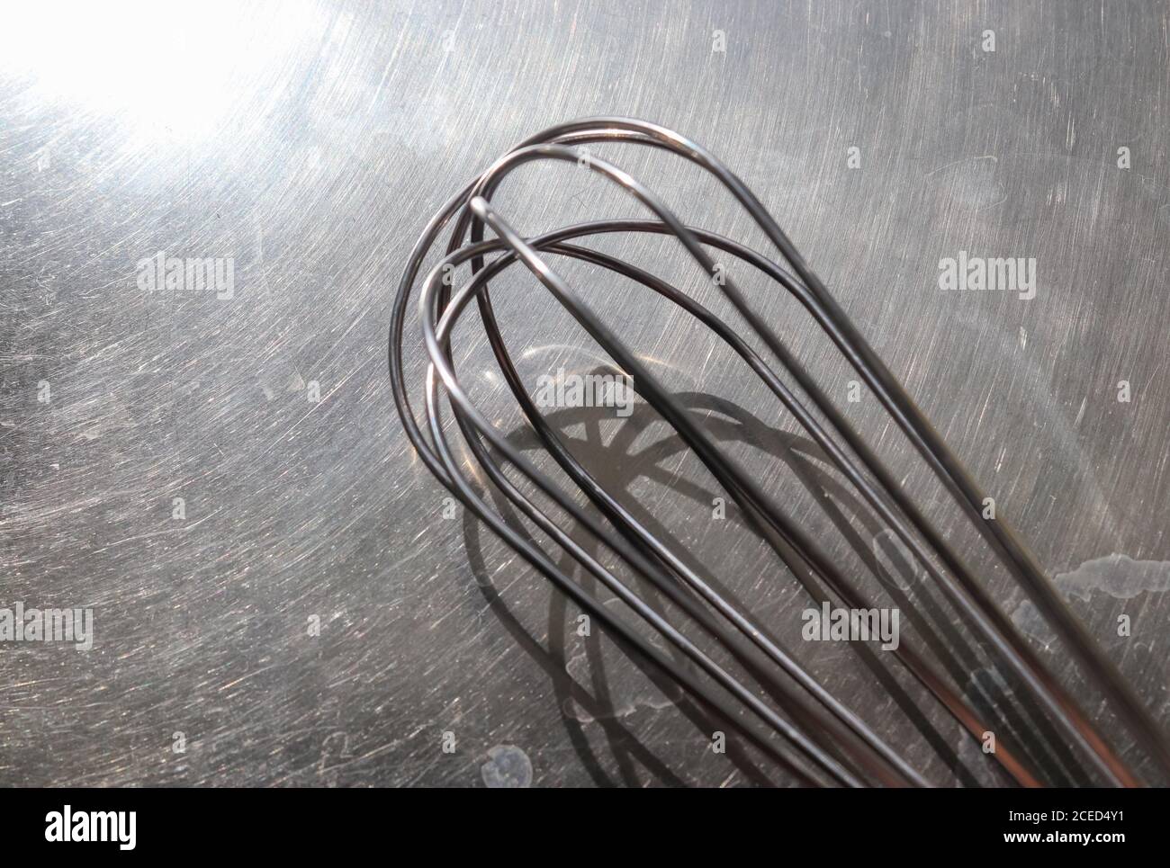 Manual hand mixer for blending, beating, Egg beater isolated on metal ...