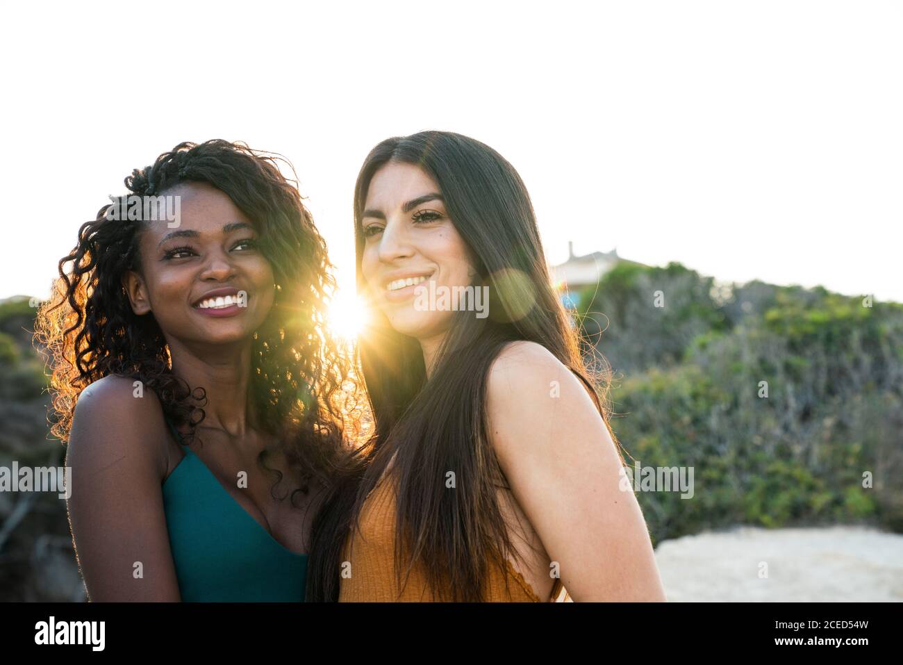 Women standing close together hi-res stock photography and images - Alamy