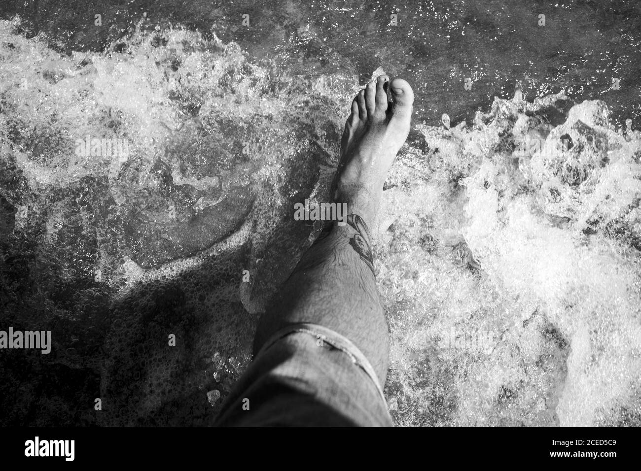 Foot in water Black and White Stock Photos & Images - Alamy