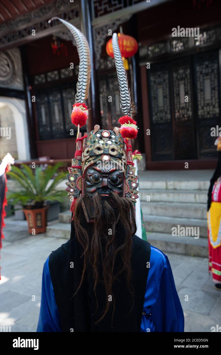 Miao person wearing traditional mask Stock Photo - Alamy