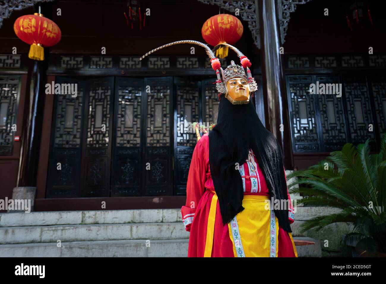 Miao person wearing traditional mask Stock Photo - Alamy
