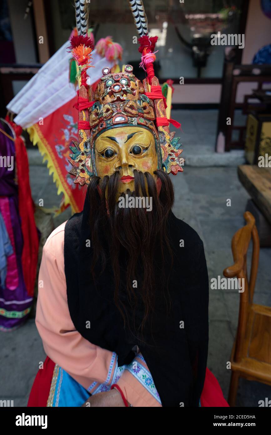 Miao person wearing traditional mask Stock Photo - Alamy