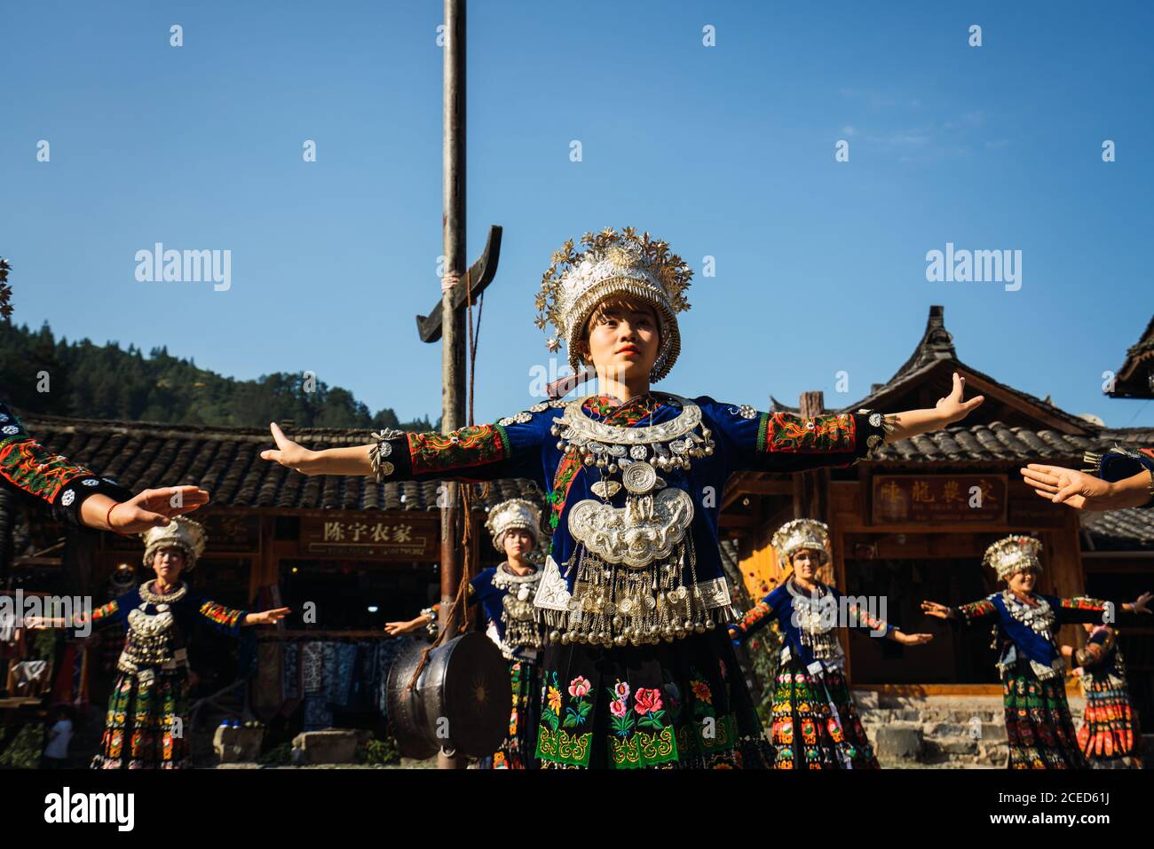GUINZHOU, CHINA - JUNE 14, 2018: Females of Miao ethnic group in bright ...