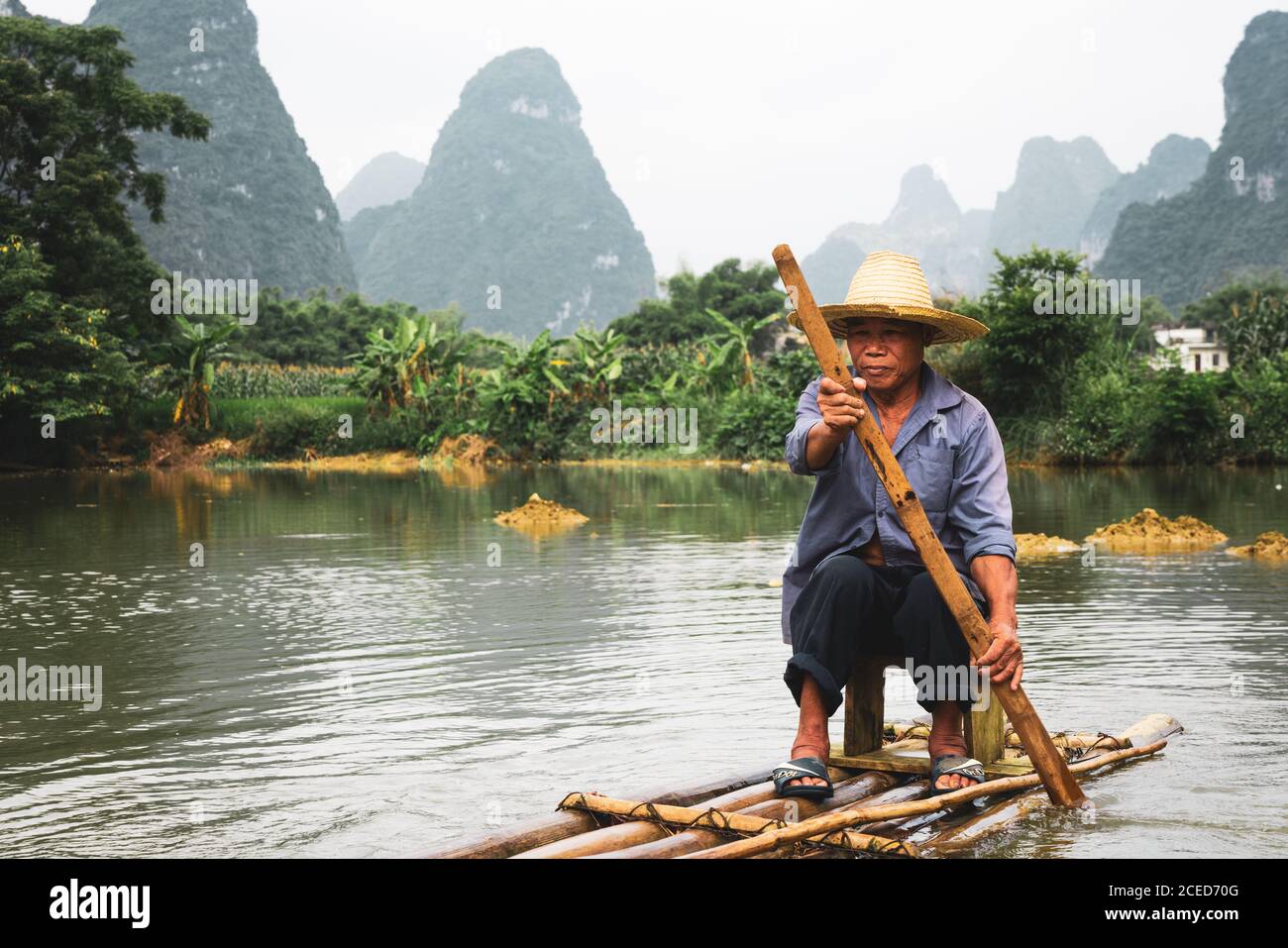 Raft man on bamboo raft hi-res stock photography and images - Alamy