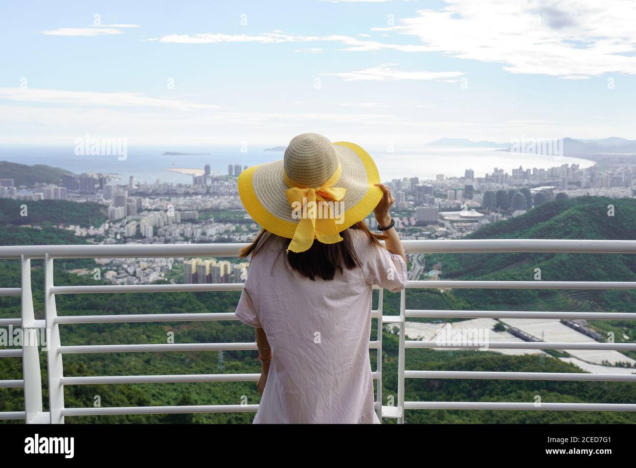 Woman on viewpoint exploring amazing landscape Stock Photo - Alamy