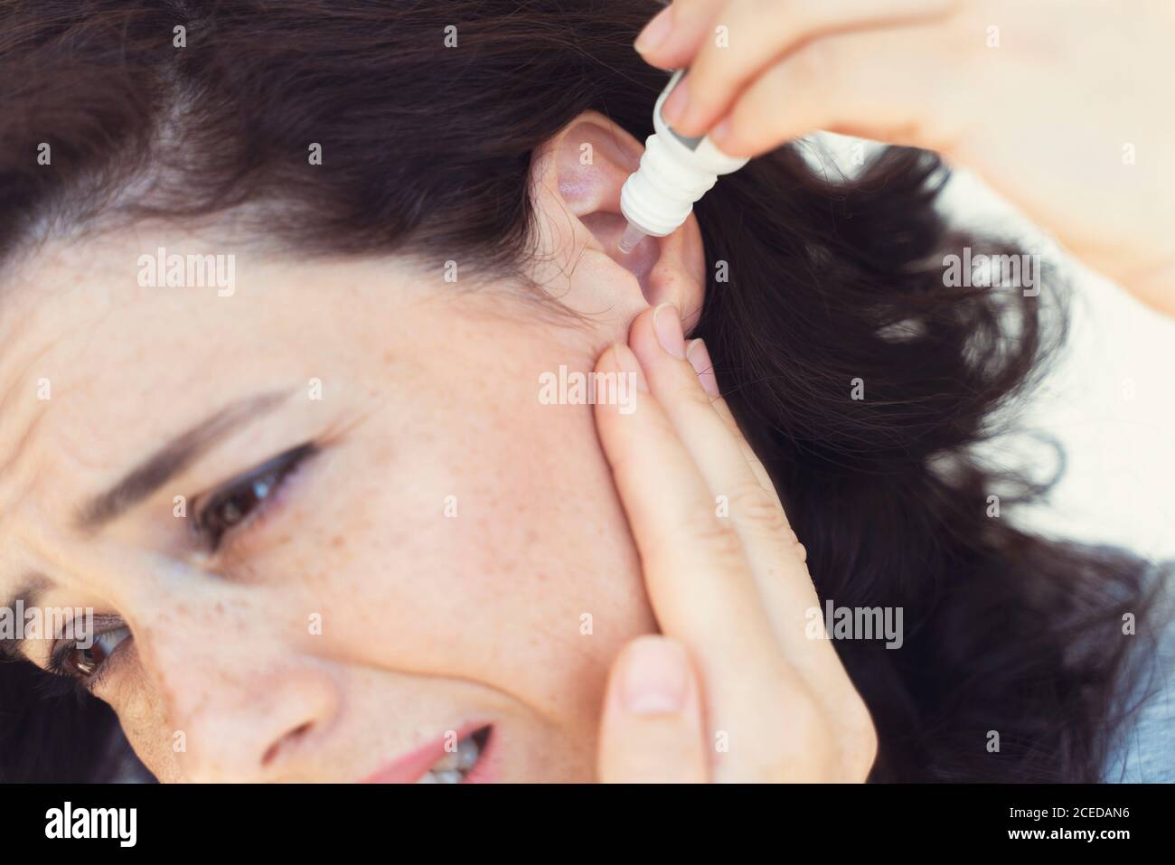 Ear drops hi-res stock photography and images - Alamy