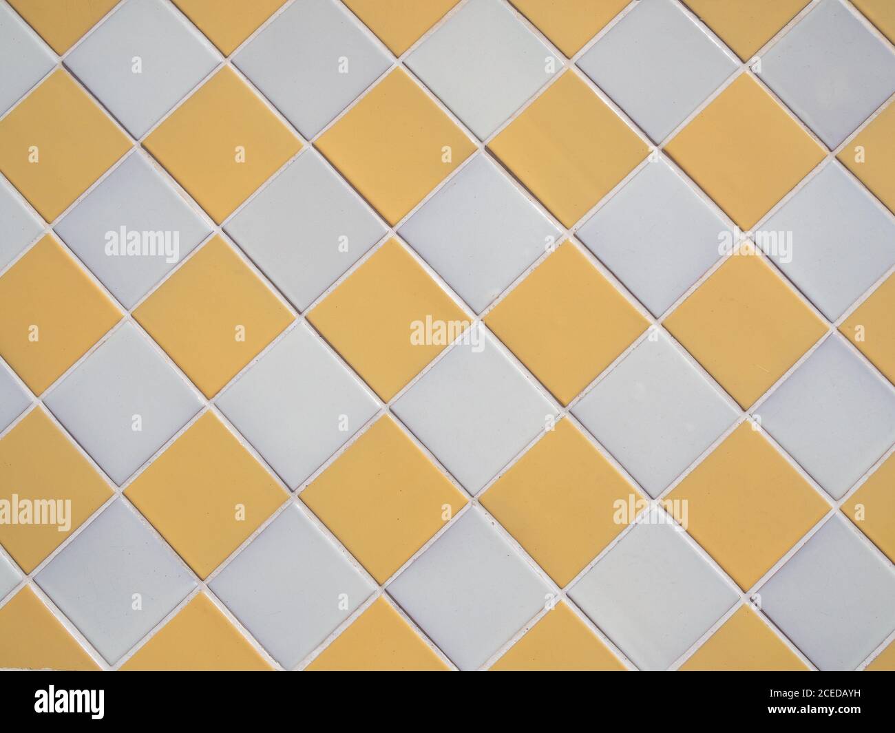 Real antique wall tiles background texture. Yellow and white diagonal ...
