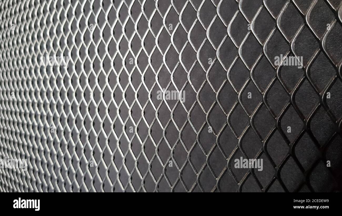Metal mesh seamless pattern. Black metal mesh texture on a black ...