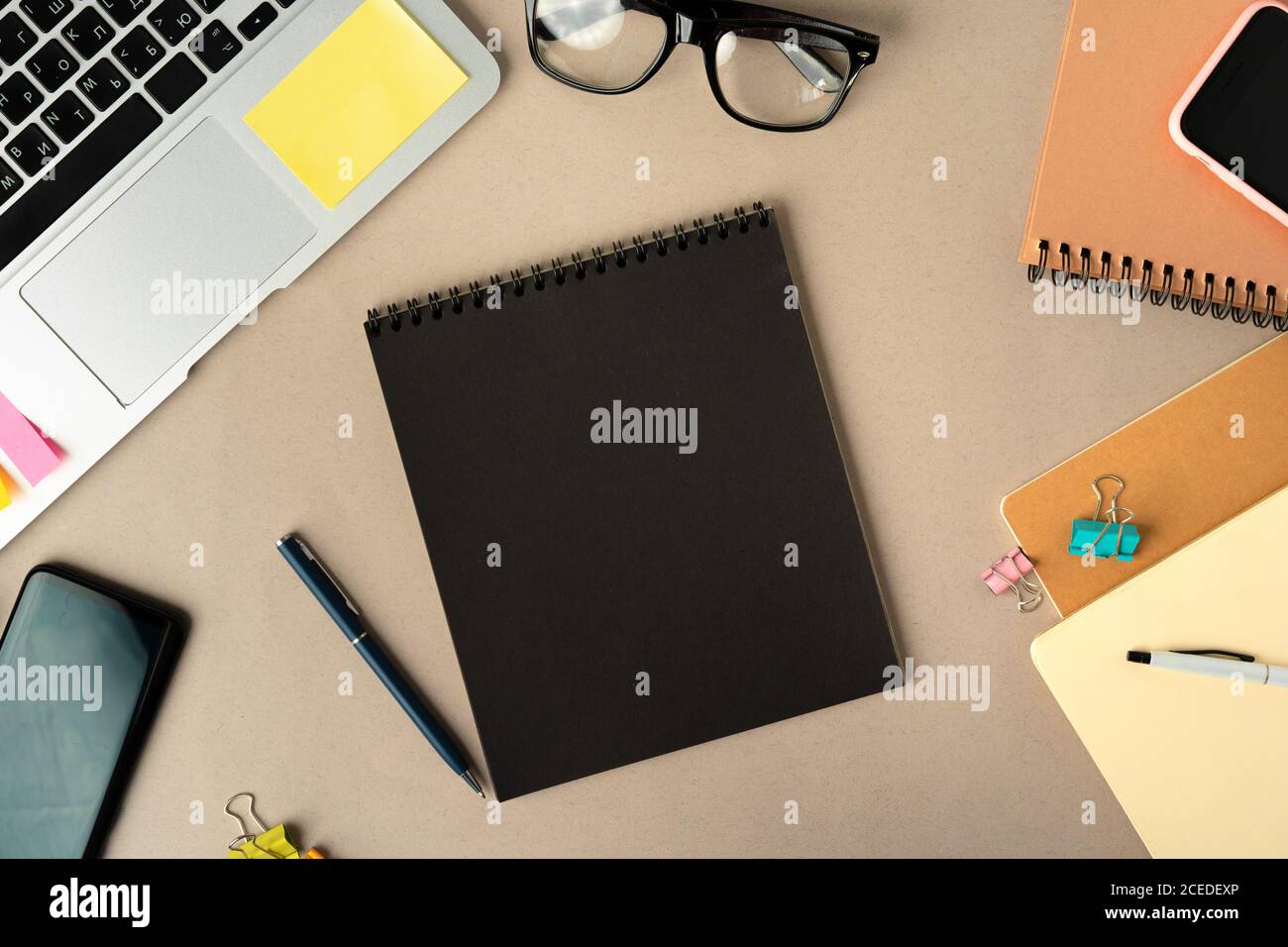 Open laptop with blank notebook, view from above. Workplace concept ...