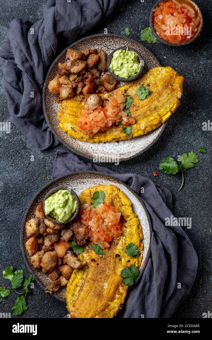 Top view of Central American dish patacon or toston fried green ...