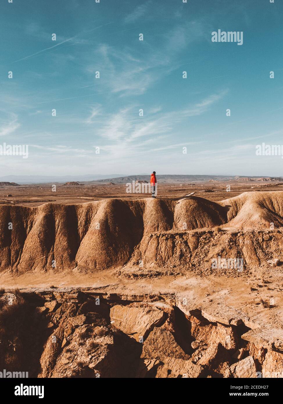 Tourist on sandy canyon hills Stock Photo - Alamy