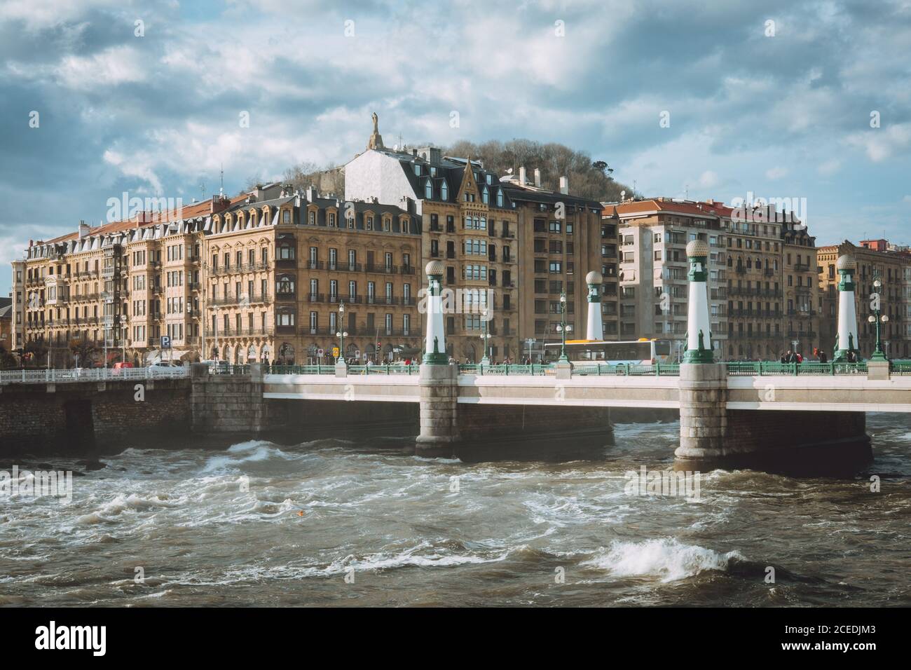 Exterior view of bridge and urban riverfront with buildings of amazing ...