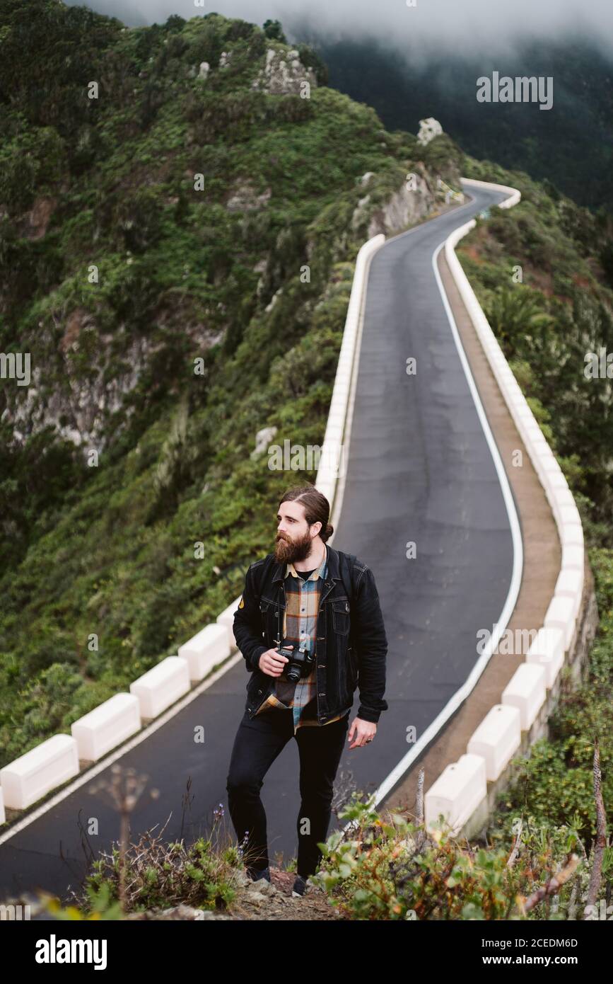 Bearded male traveler photographer camera hi-res stock photography and ...