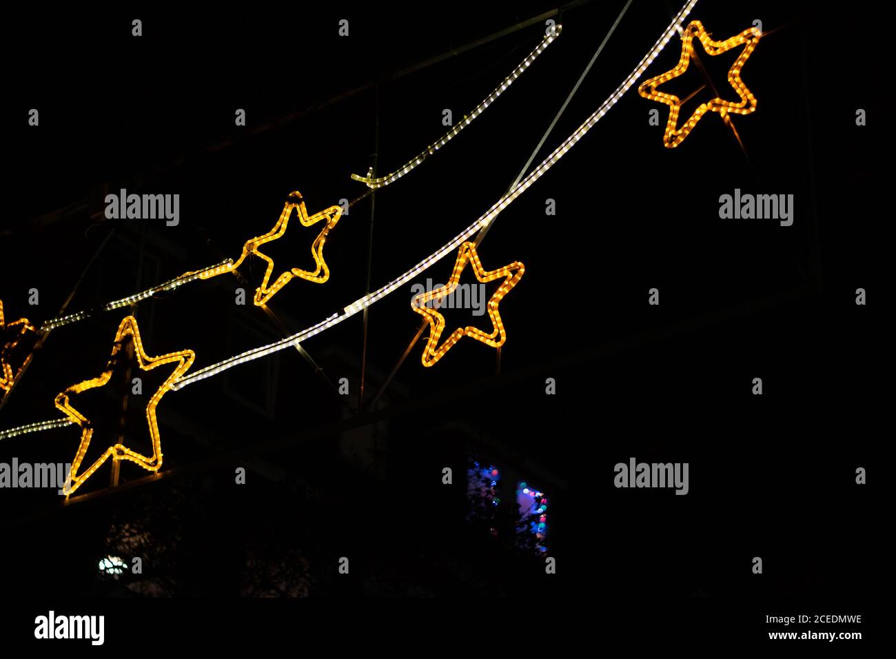 Night lights in star shapes on a black background Stock Photo - Alamy