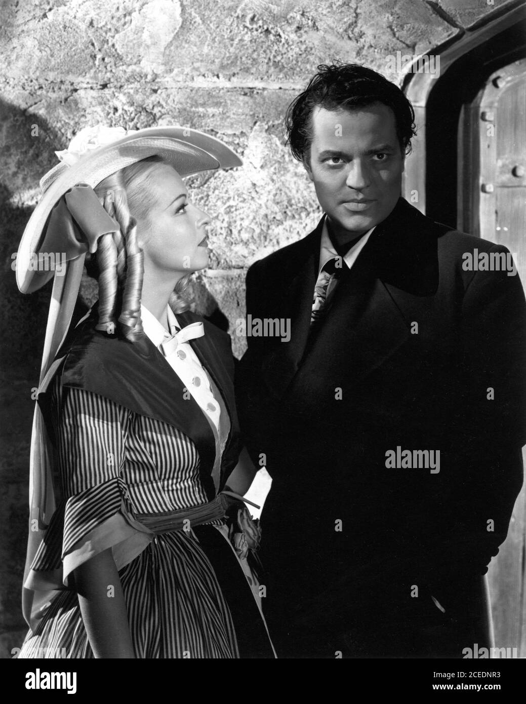 HILLARY BROOKE as Blanche Ingraham and ORSON WELLES as Edward Rochester ...