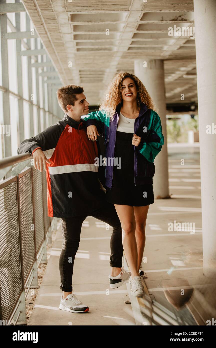 Young couple in roofed pathway Stock Photo - Alamy