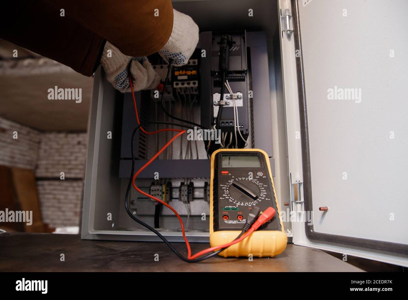 Checking electrical panel and power cable for short circuit Stock Photo ...