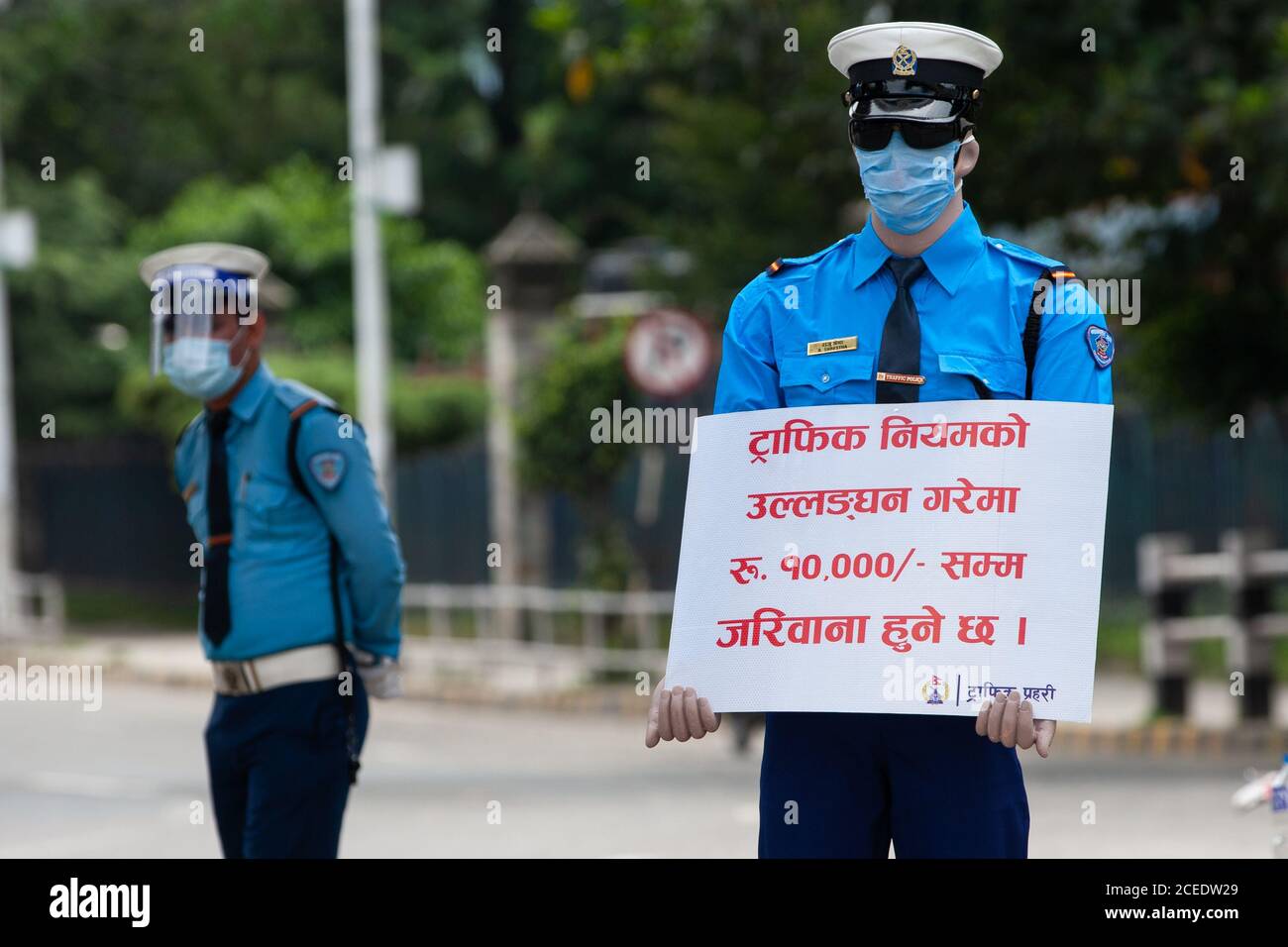 Kathmandu, Nepal. 01st Sep, 2020. A policeman wearing a face shield ...