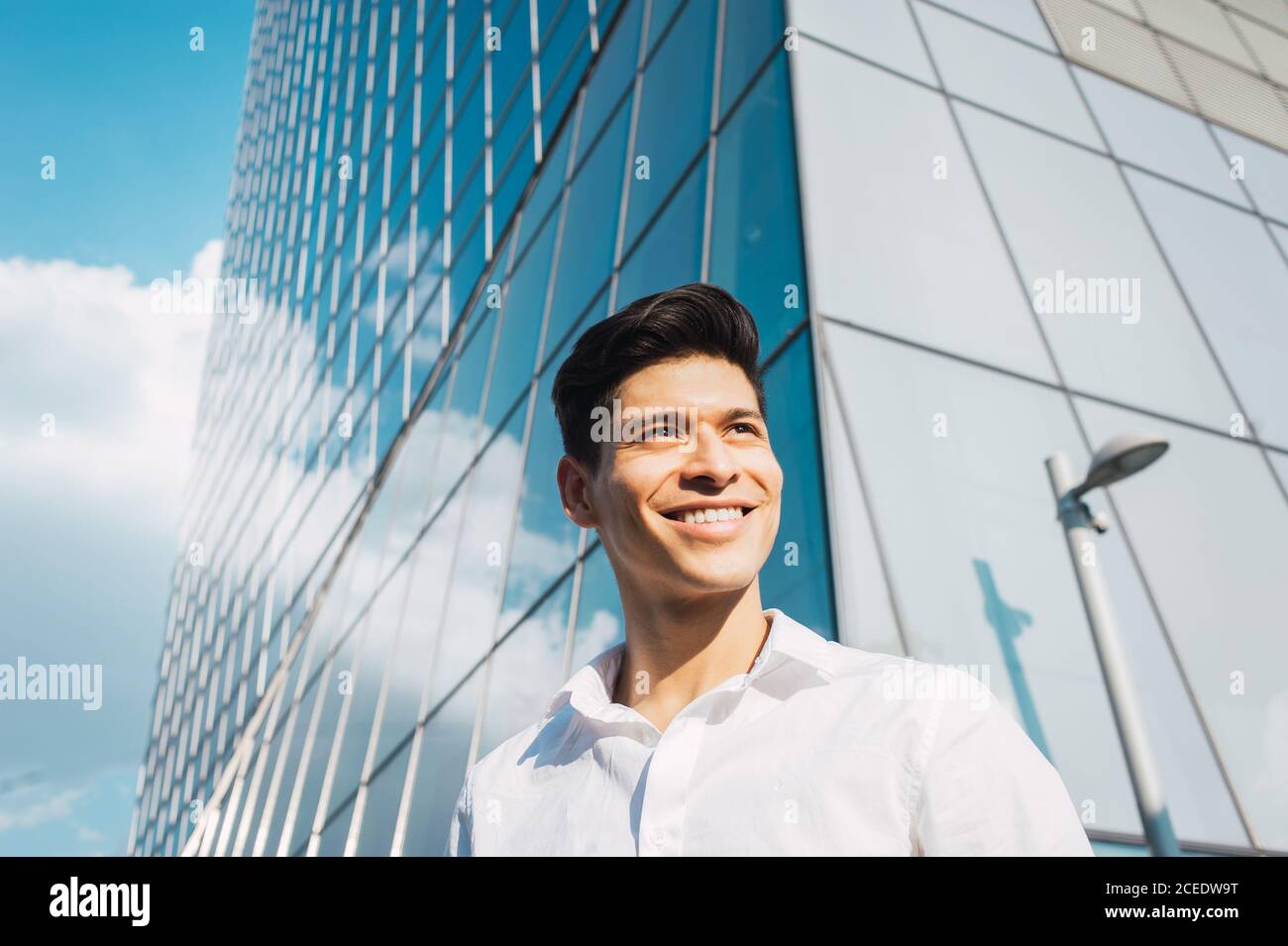 Skyscraper young man hi-res stock photography and images - Alamy