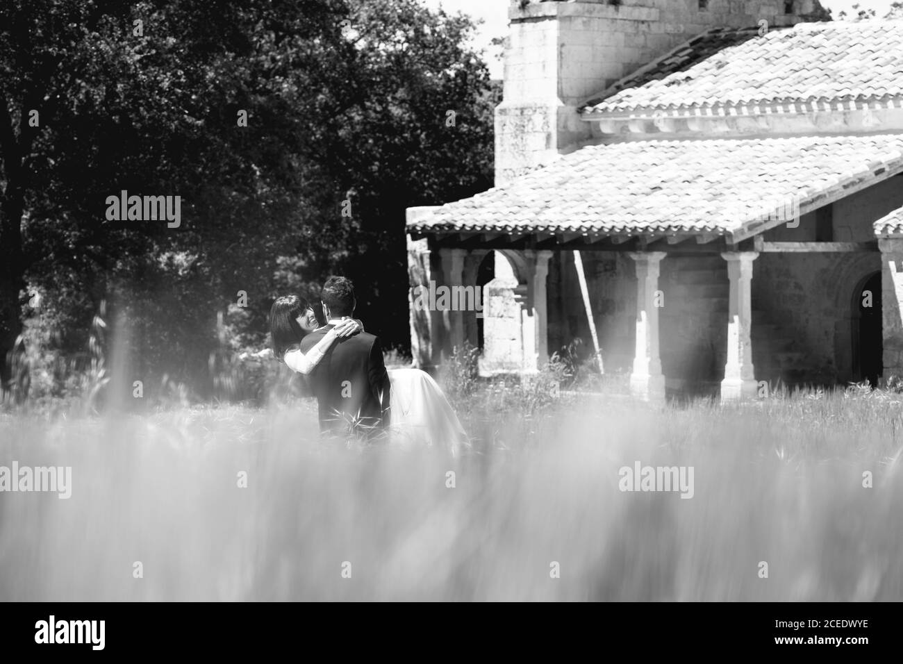 Young man in love standing Black and White Stock Photos & Images - Alamy