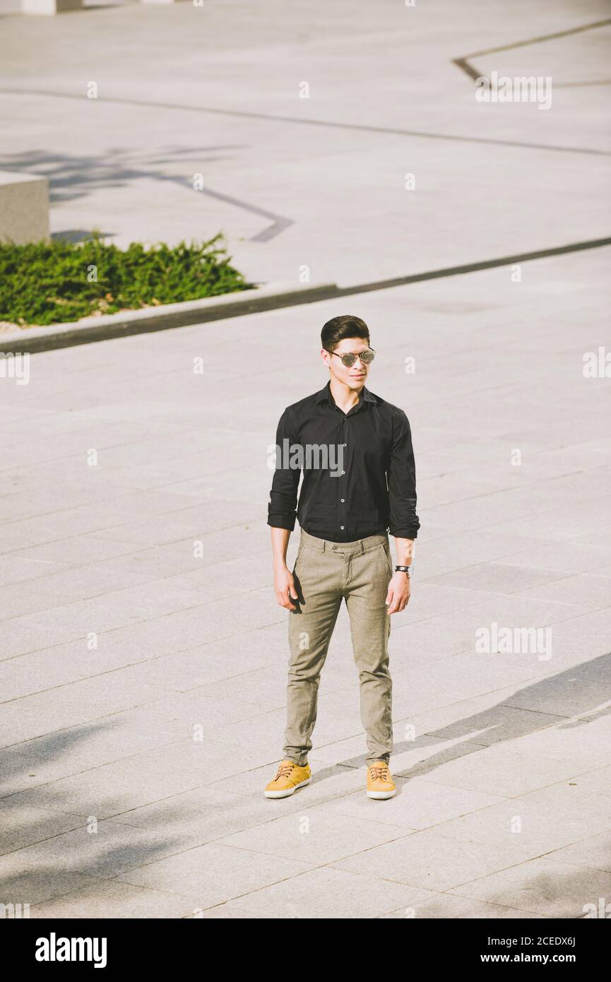 Man walking pavement away hi-res stock photography and images - Alamy