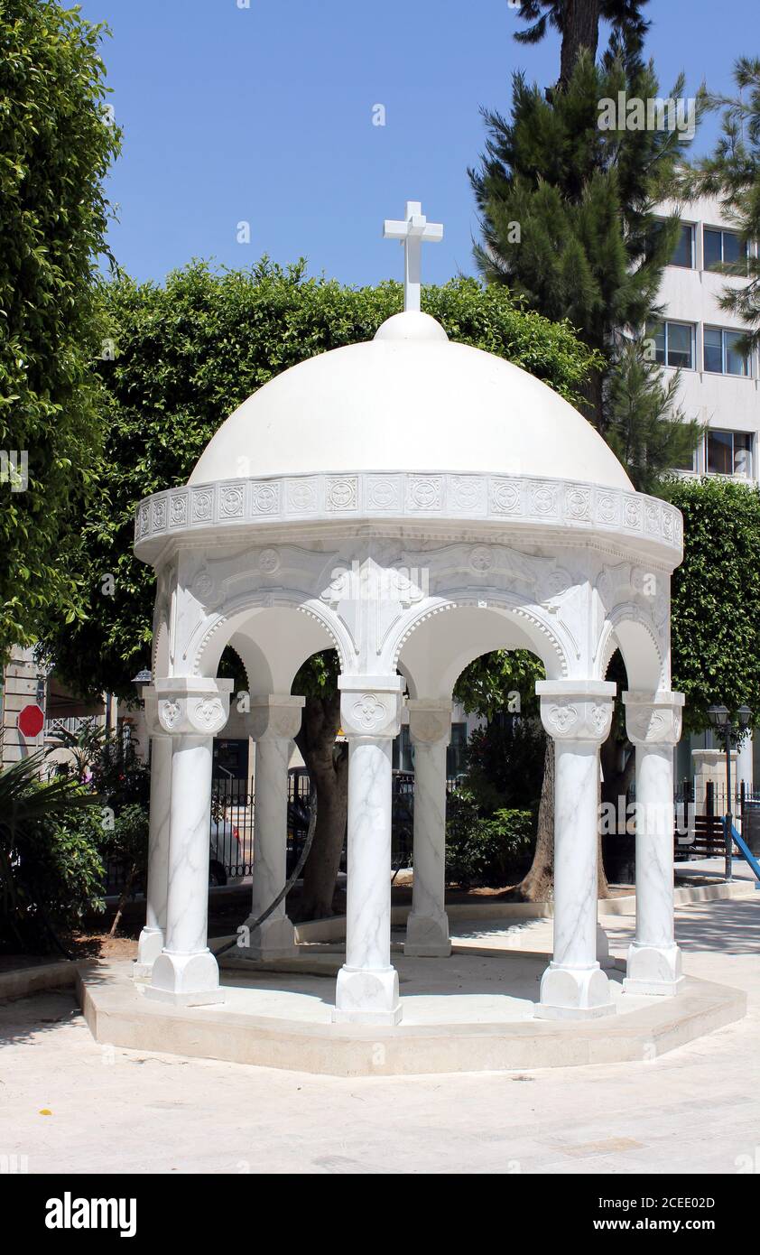 Ornate and whitewashed Mediterranean Rotunda located adjacent to Church ...