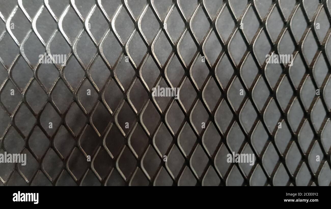 Metal mesh seamless pattern. Black metal mesh texture on a black ...