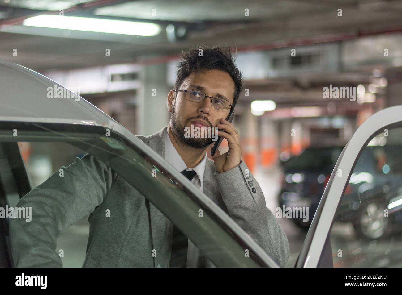 Asian businessman driving car hi-res stock photography and images - Alamy