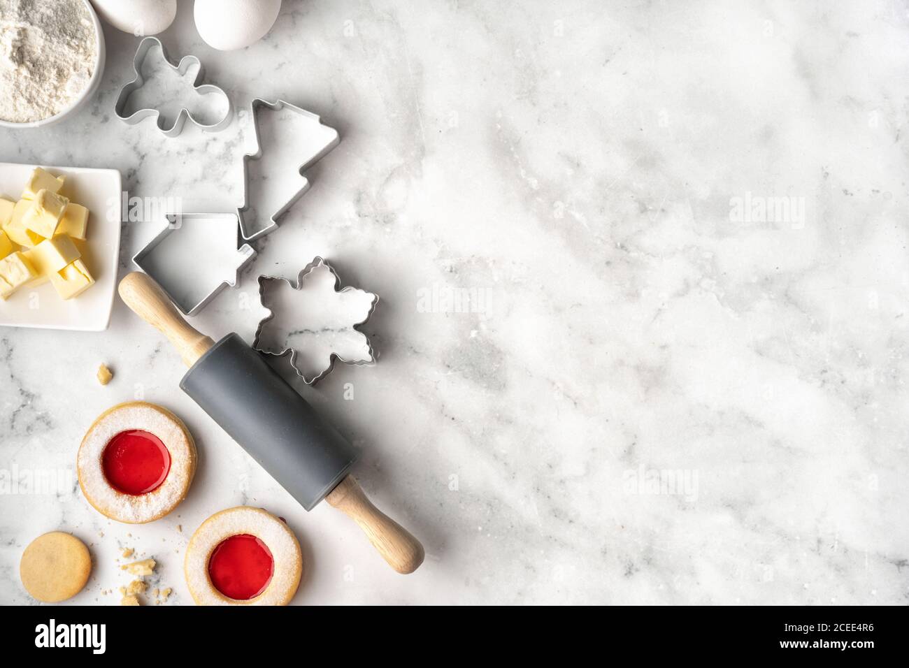 Christmas baking background with ingredients for making cookies on ...