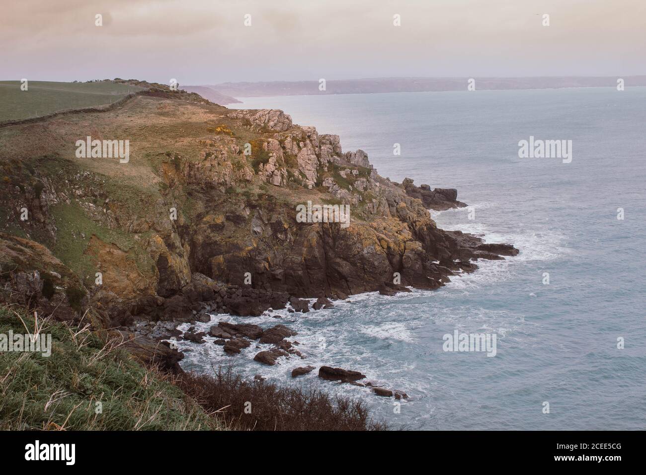 a picture of the Cornish coast, with the sun hitting the rocks Stock ...