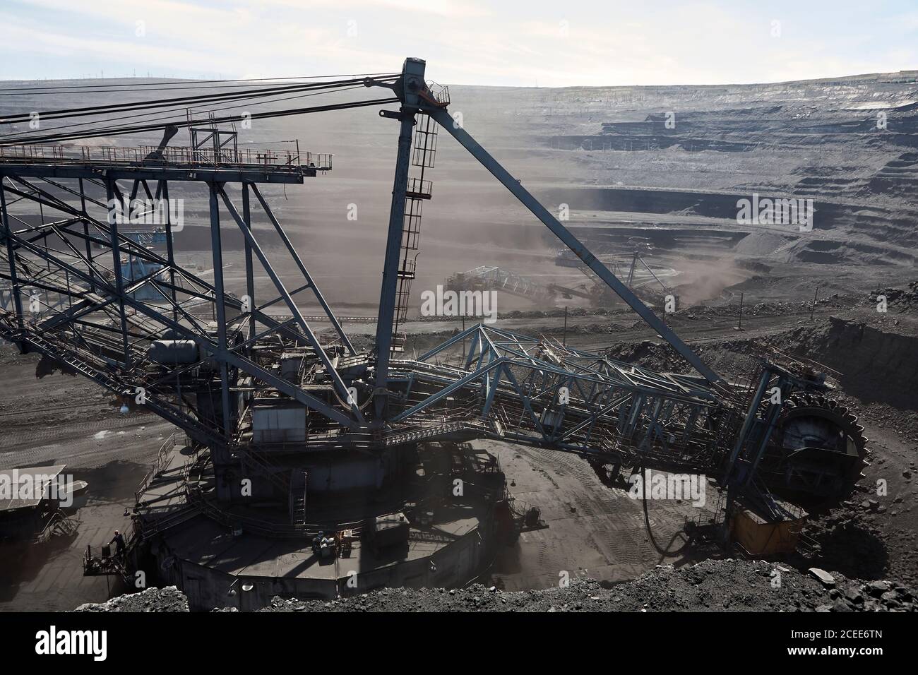 Big black coal mine with machines Stock Photo - Alamy