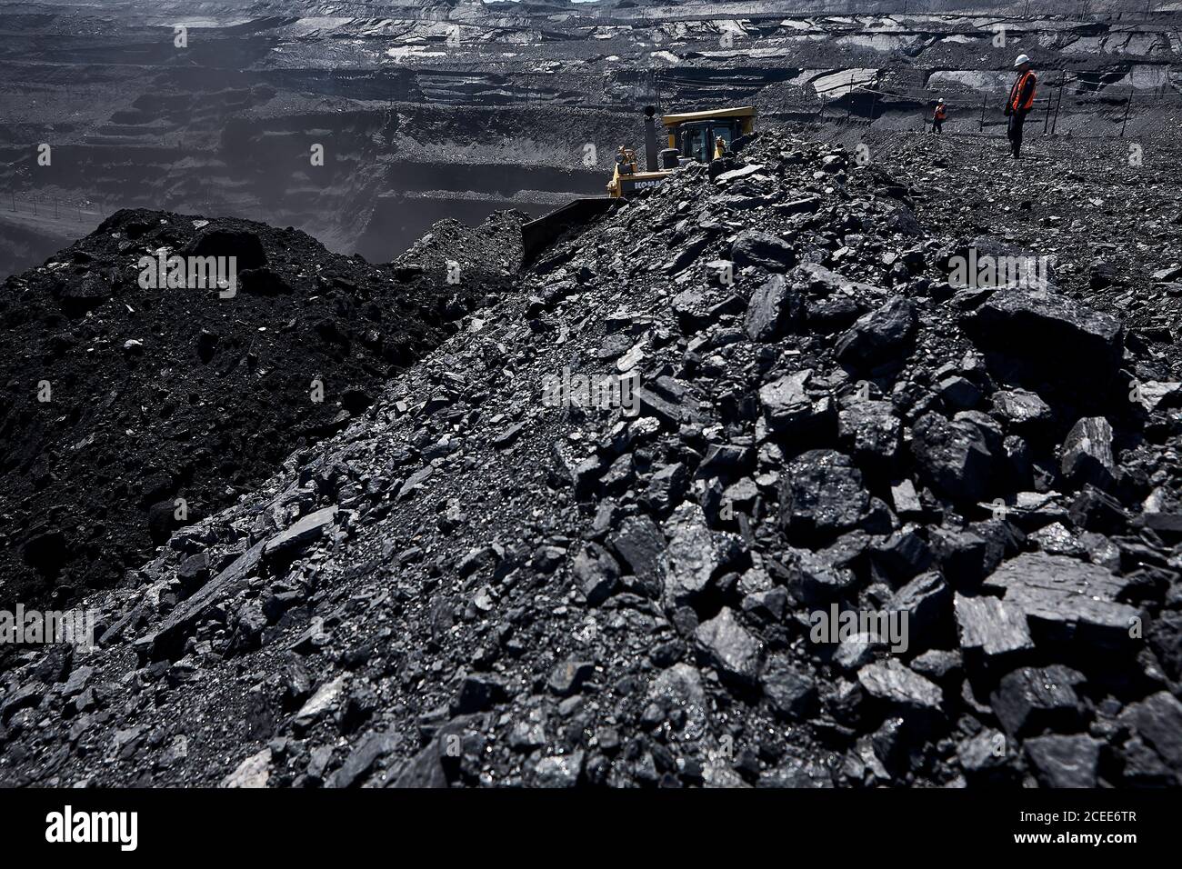 Big black coal mine with machines Stock Photo - Alamy