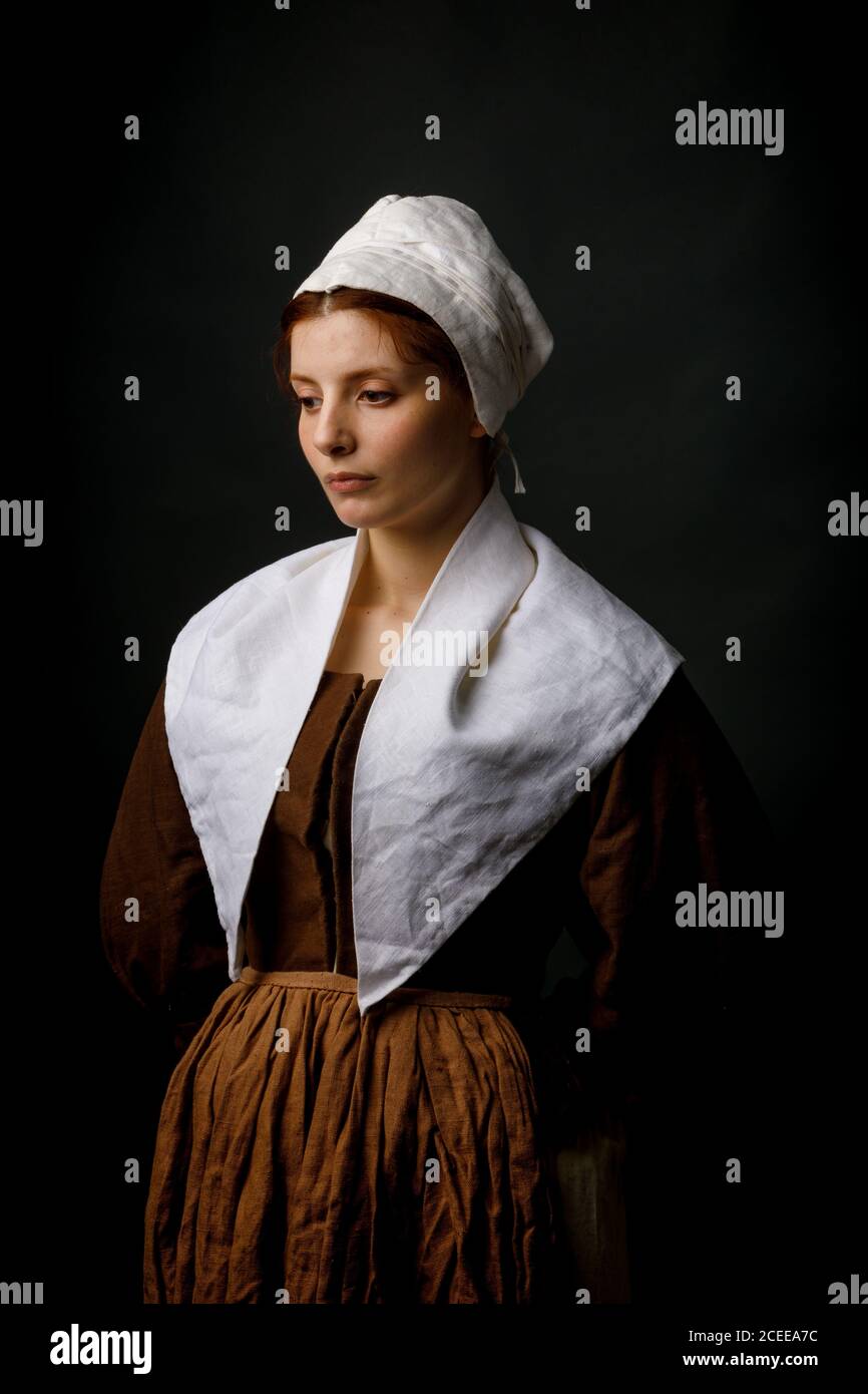 Medieval maid posing in studio Stock Photo - Alamy