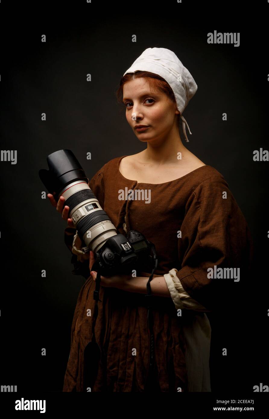 Medieval Woman with photo camera Stock Photo - Alamy