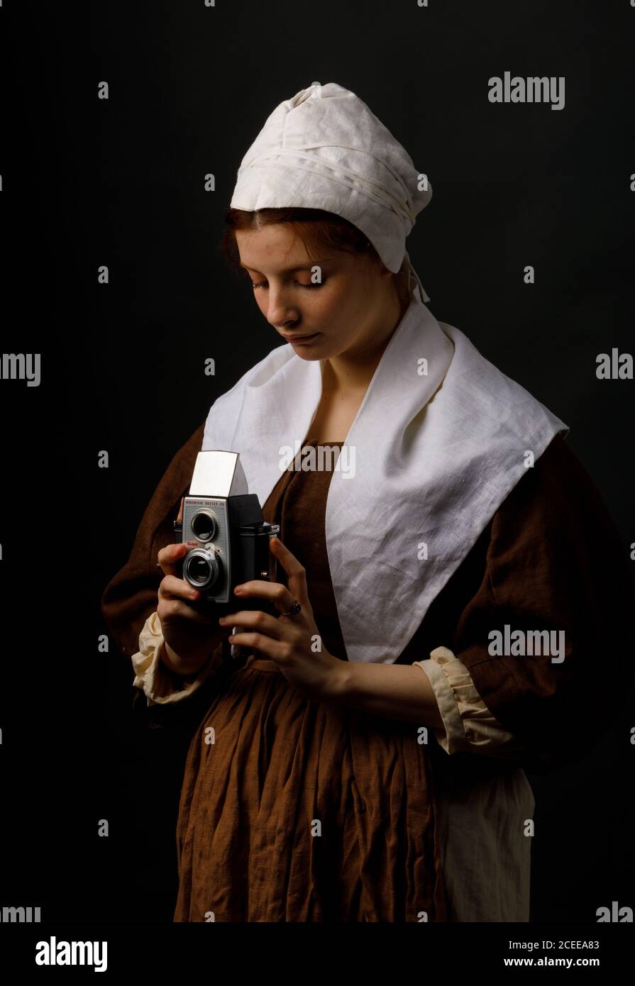 Medieval Woman with photo camera Stock Photo - Alamy