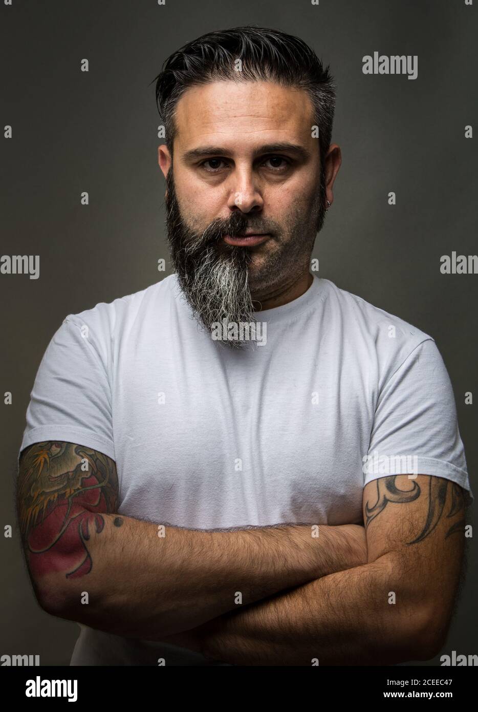 Confident man with half beard Stock Photo - Alamy