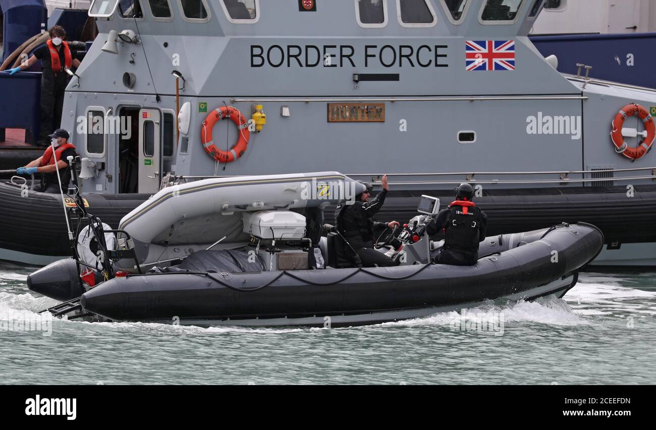A RIB is carried into into Dover, Kent, on a Border Force RIB following ...
