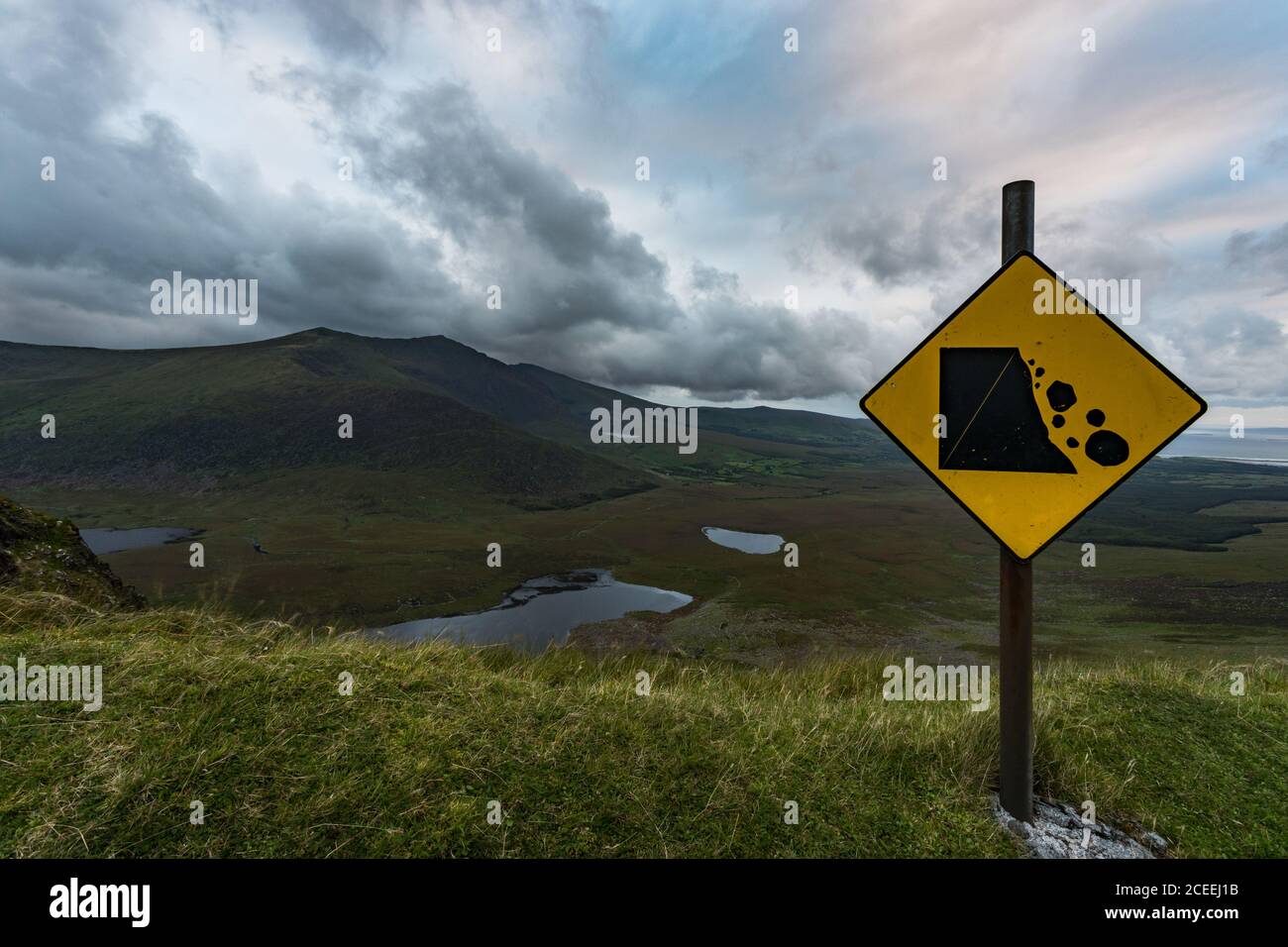 falling cliff edge warning sign over the Connoer pass on the Dingle ...