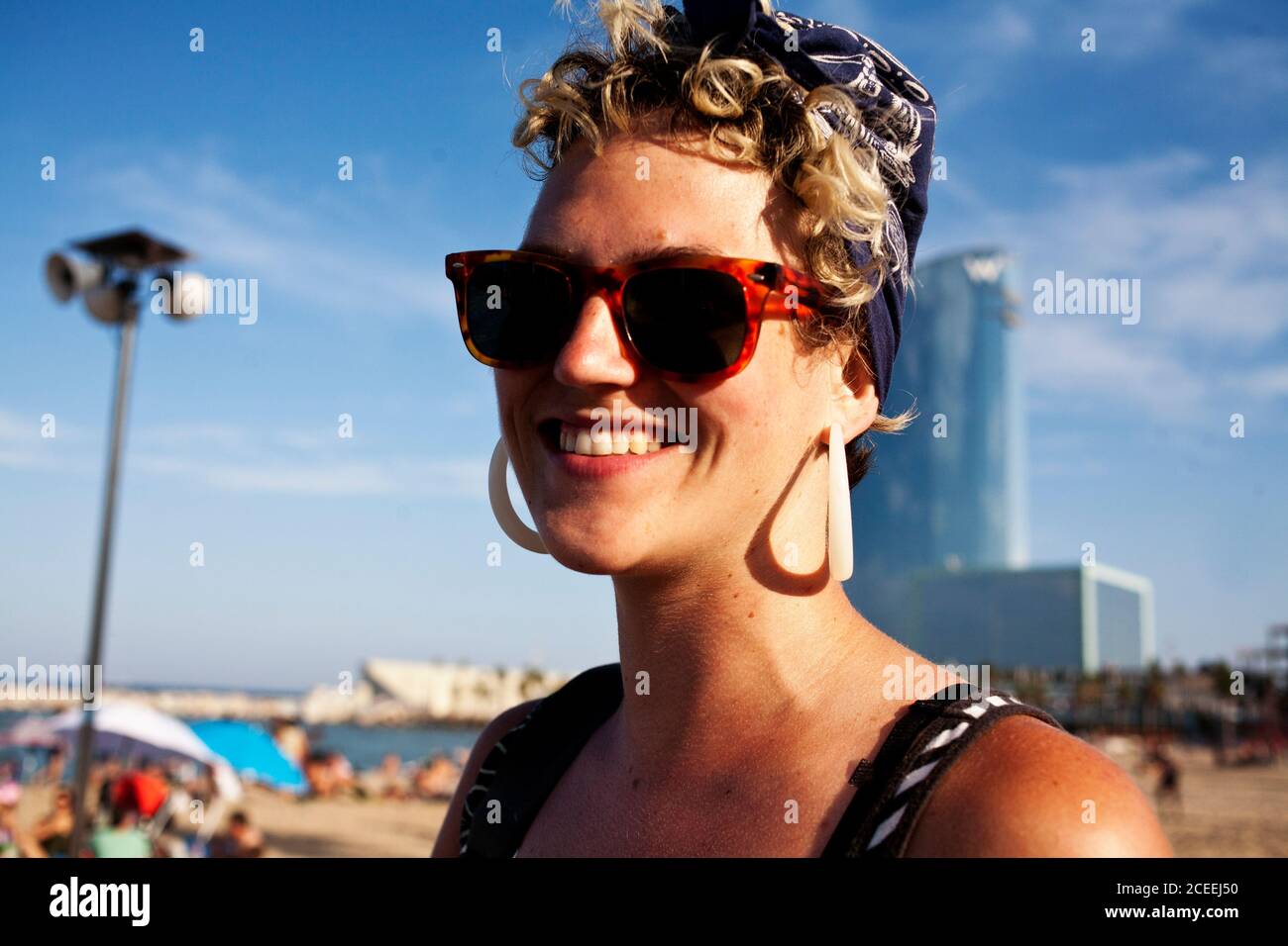 BARCELONA - July 10, 2011: Portrait of laughing stylish Woman in ...