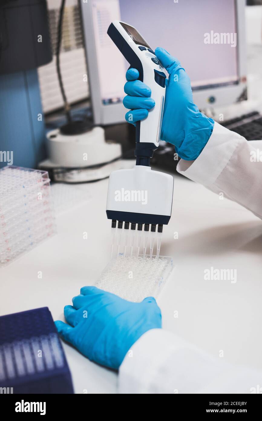 Person using laboratory equipment Stock Photo - Alamy