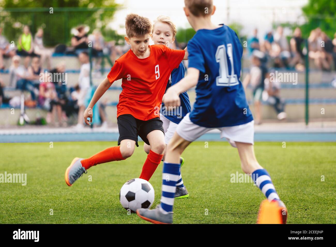 Boys play soccer hi-res stock photography and images - Alamy
