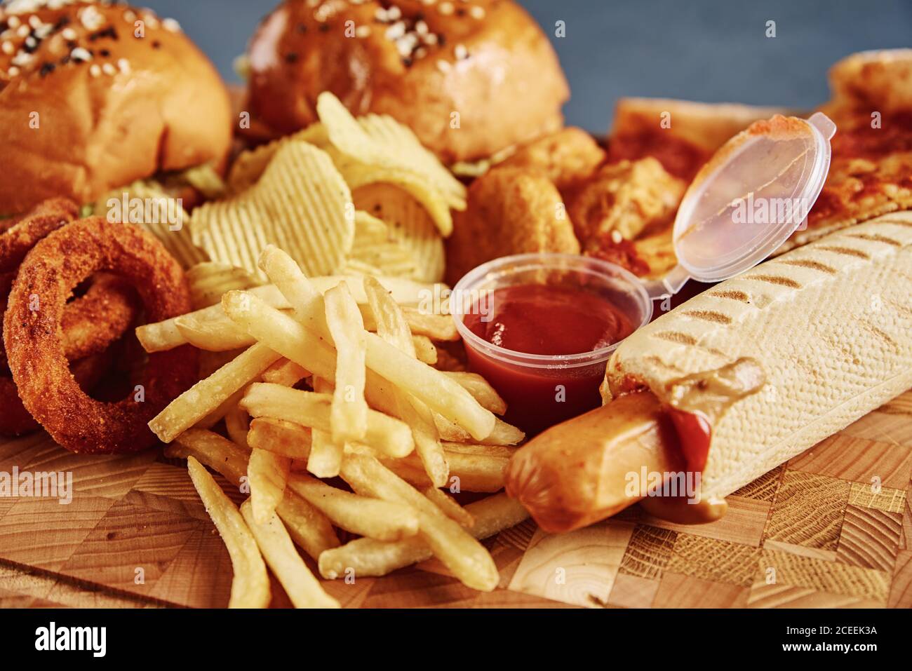 Unhealthy and junk food. Different types of fast food on the table ...