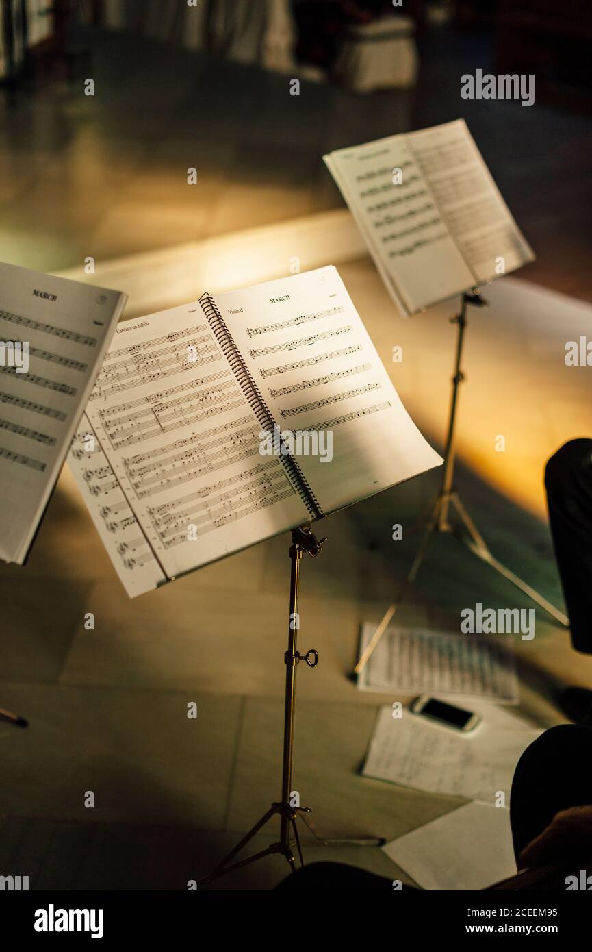Sheets with music notes on the stands on the stage Stock Photo - Alamy