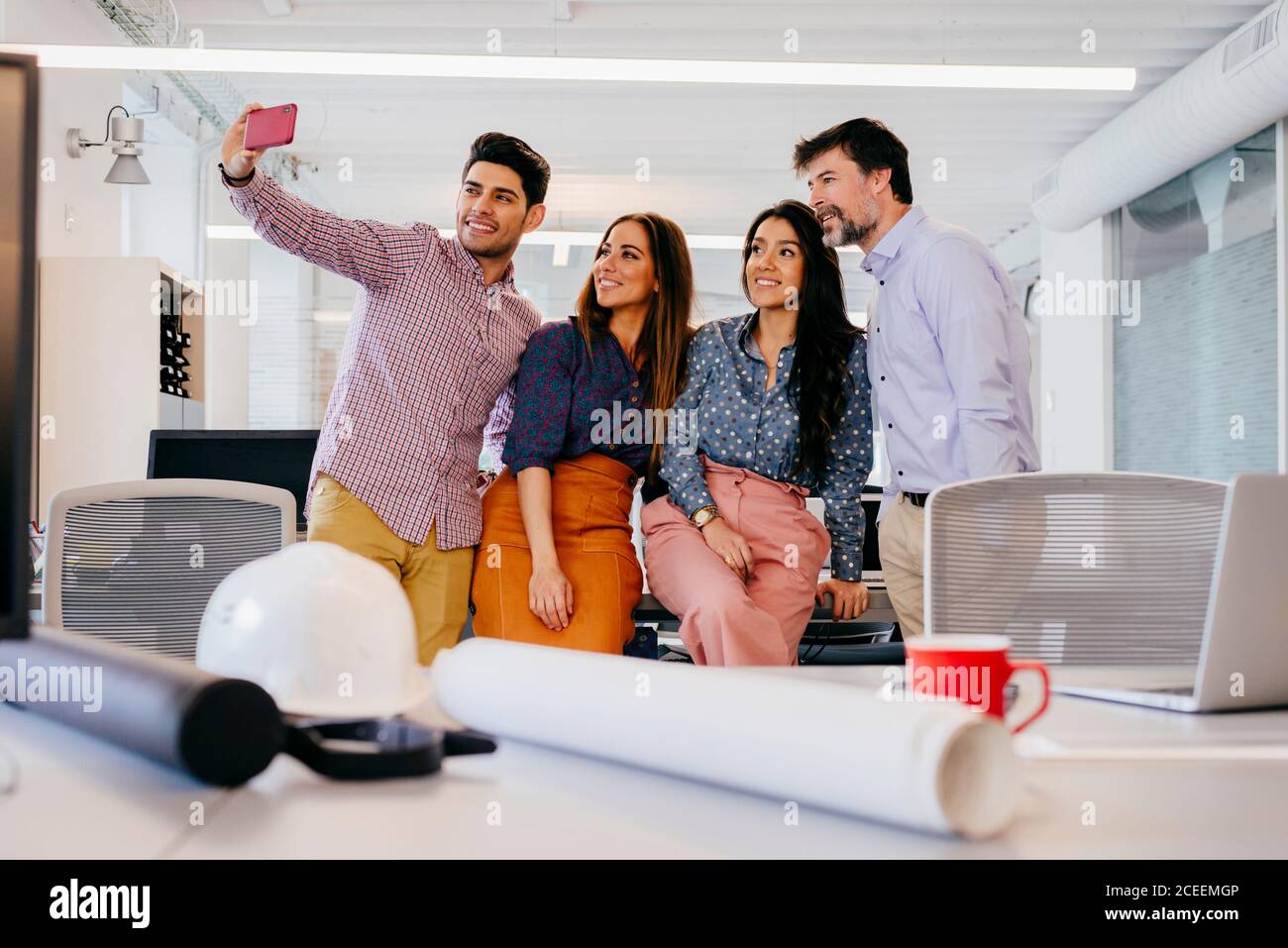 Multiracial employee taking up hi-res stock photography and images - Alamy