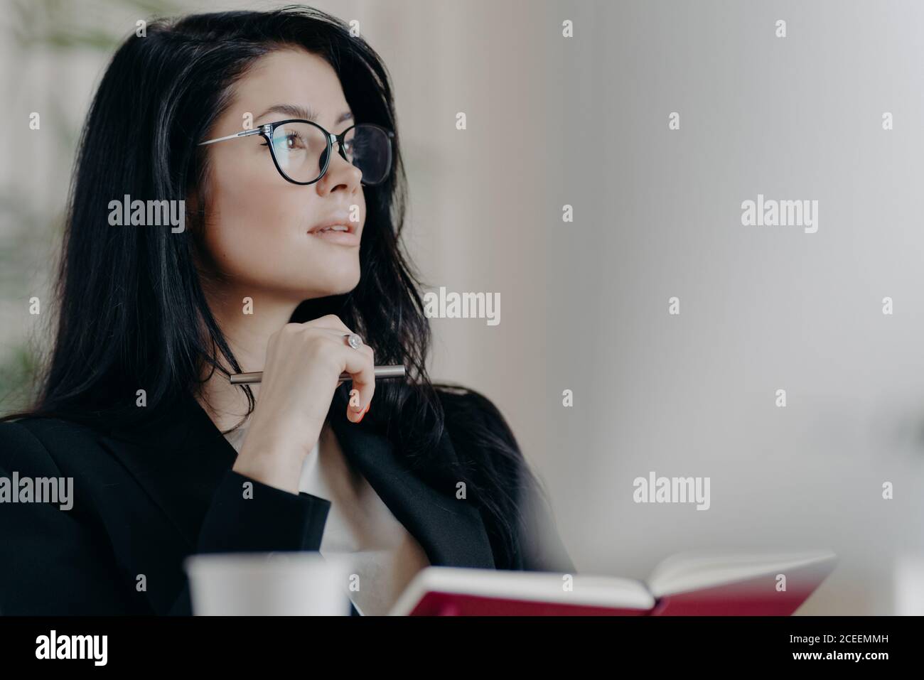 Woman writer writes notes in hi-res stock photography and images - Alamy