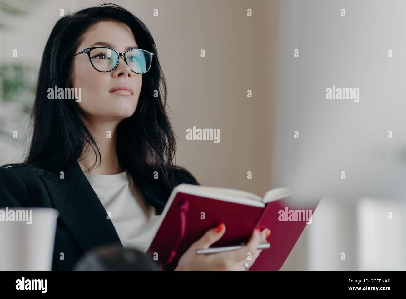 Time management beautiful woman hi-res stock photography and images - Alamy