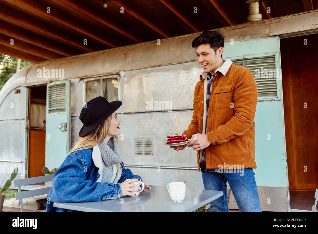 Woman giving man piece cake hi-res stock photography and images - Alamy